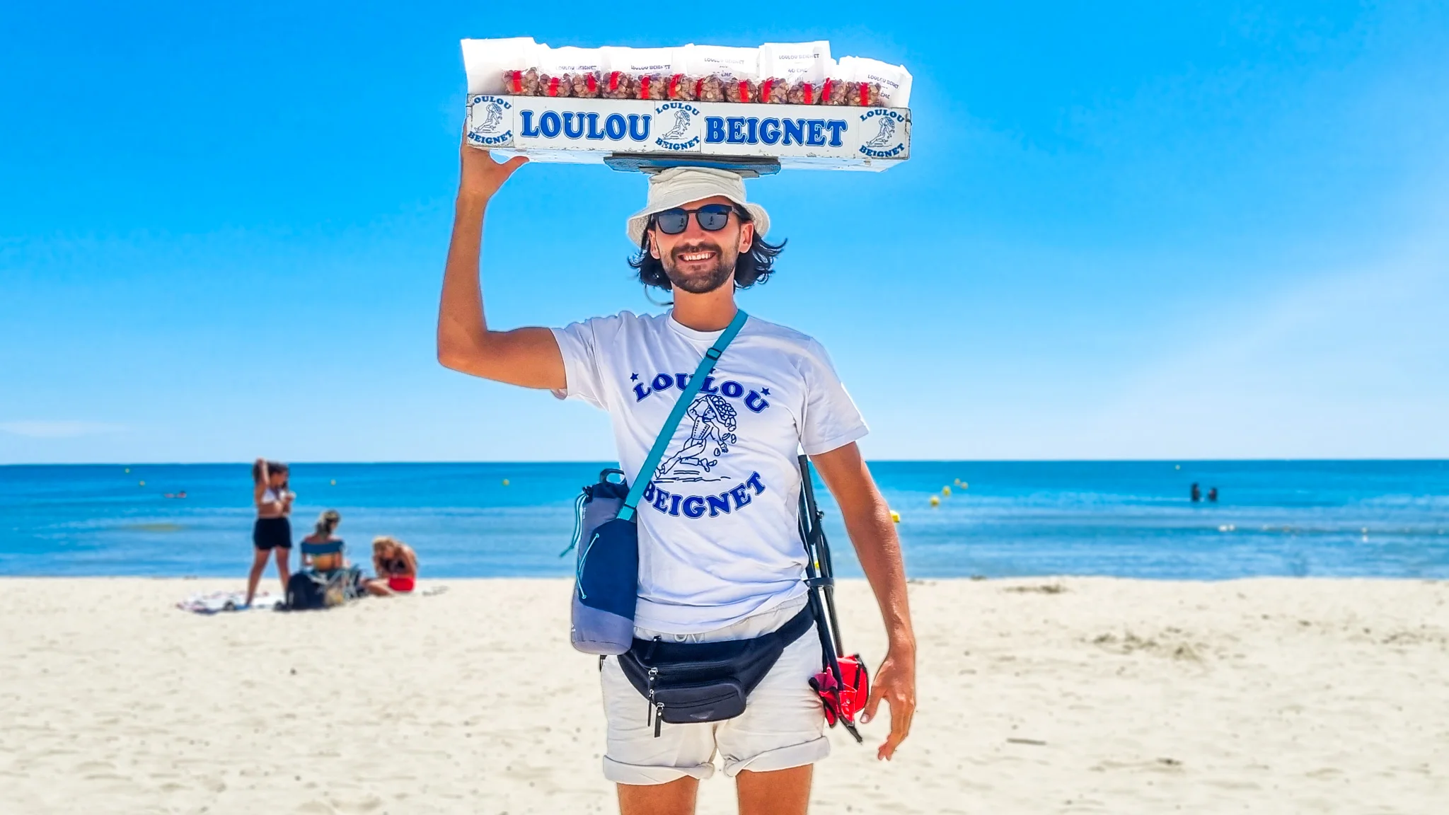 Neil, vendeur de beignets et chouchous sur la plage - CIDJ